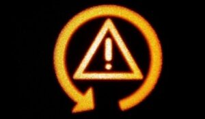 What The Orange Triangle Sign/Light On Car Dashboard Mean?