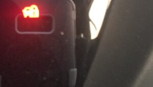 What does the Red Car With Key Symbol On Dashboard Mean?